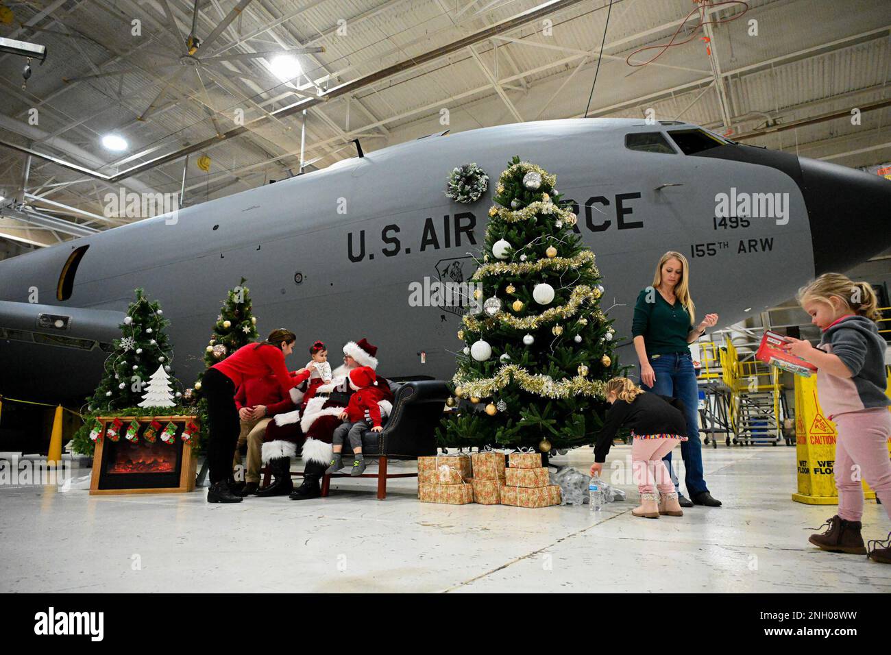 Santa Claus sits with family and Airmen of the 126th Air Refueling Wing ...