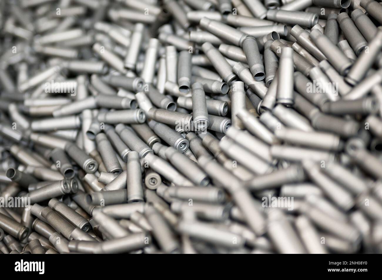 Bullet casings heap as background black and white effect Stock Photo ...
