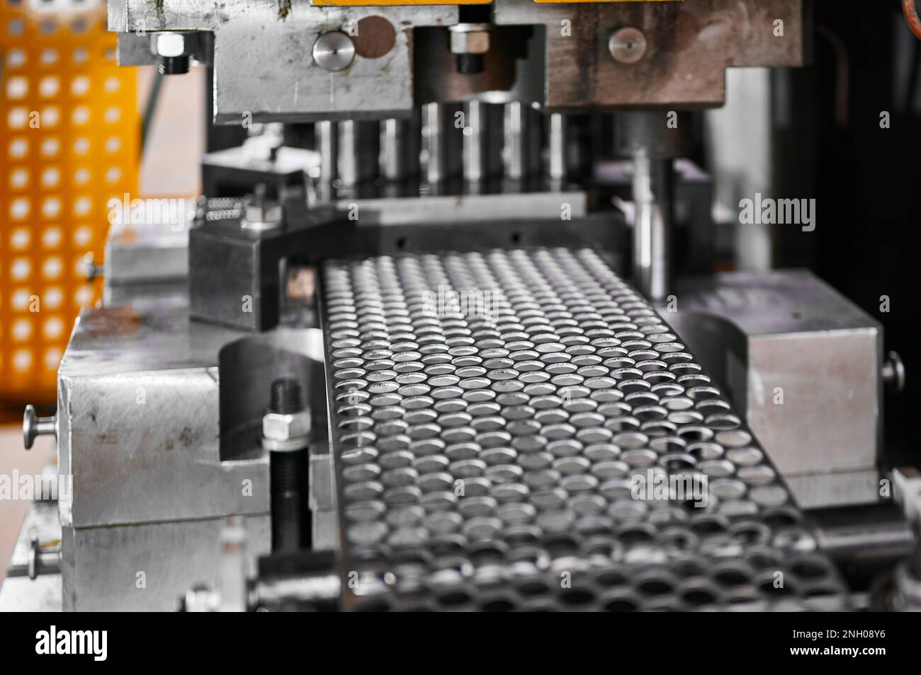 Cutting of steel blanks from metal strip on stamping press Stock Photo ...