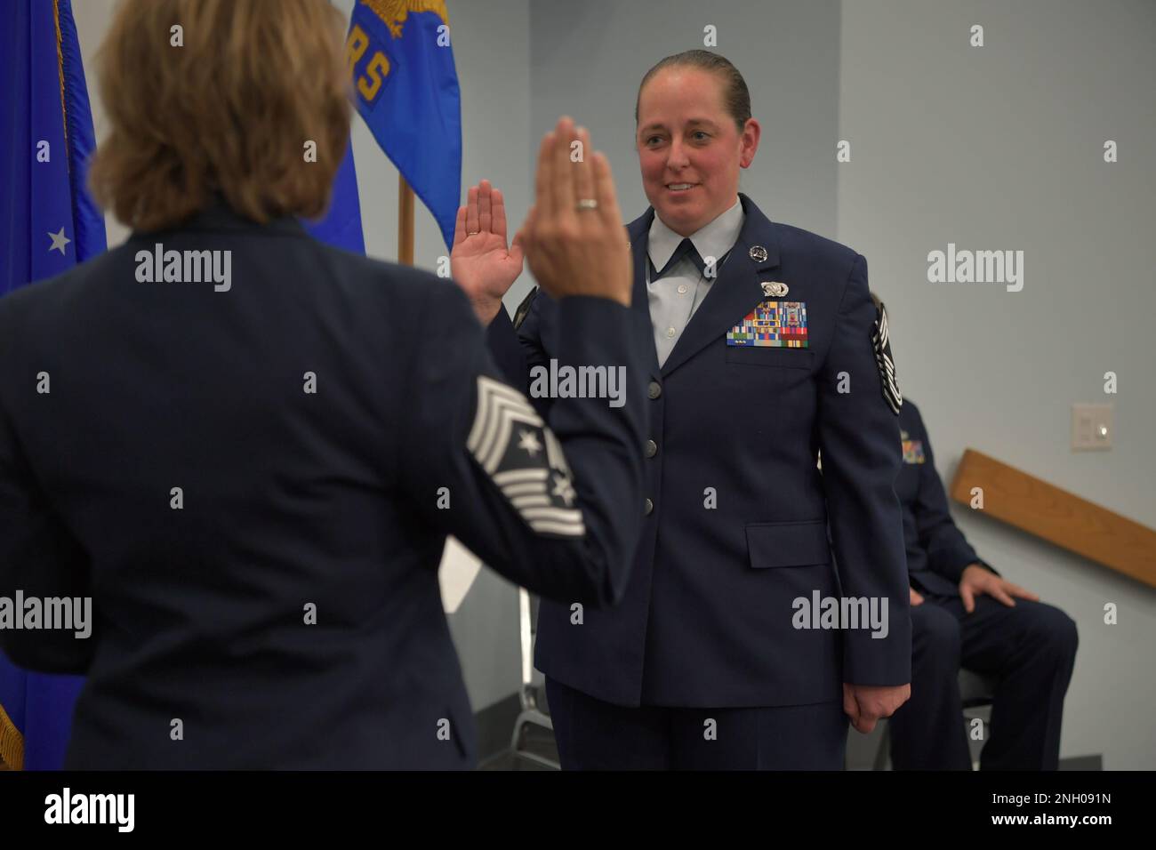 U.S. Air Force Chief Master Sgt. Jennifer Balabuch, 110th Wing command chief administers Chief ...