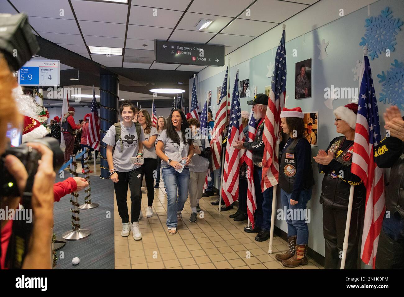Gold Star families prepare to board the plane that will transport them ...
