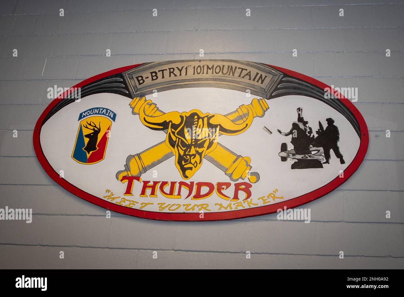 A unit emblem hung on interior of Waterbury Armory, duty station of ...