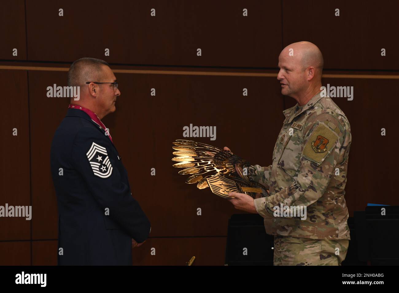 Command Chief Master Sgt. Daniel Conner receives one of his retirement ...