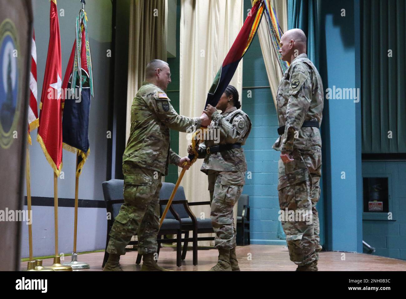 Brig. Gen. Patricia R. Wallace takes the unit guidon for one last time ...