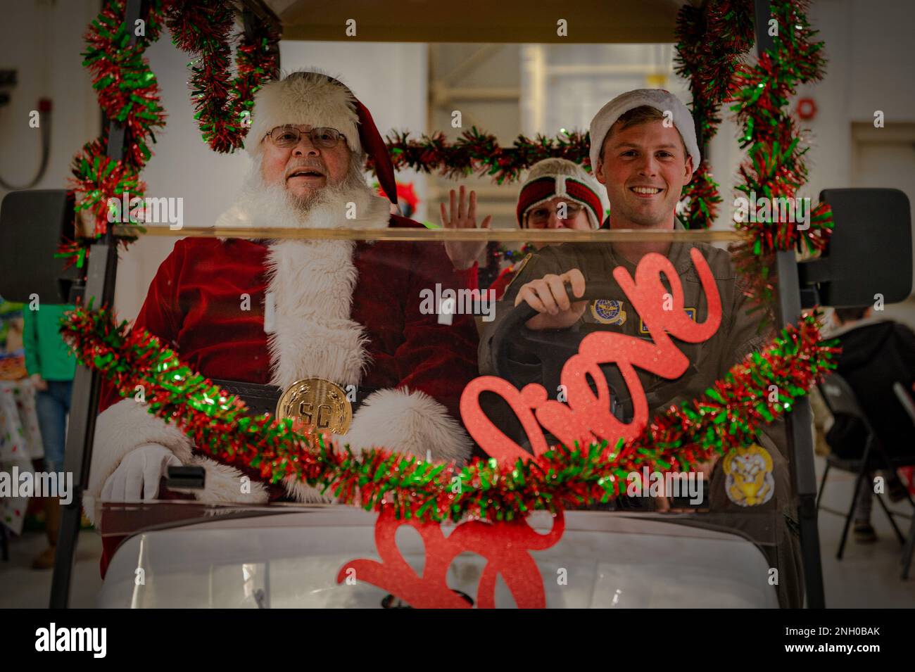 Capt. Stephen Smith-Johnson, 40th Airlift Squadron pilot, drives Santa ...