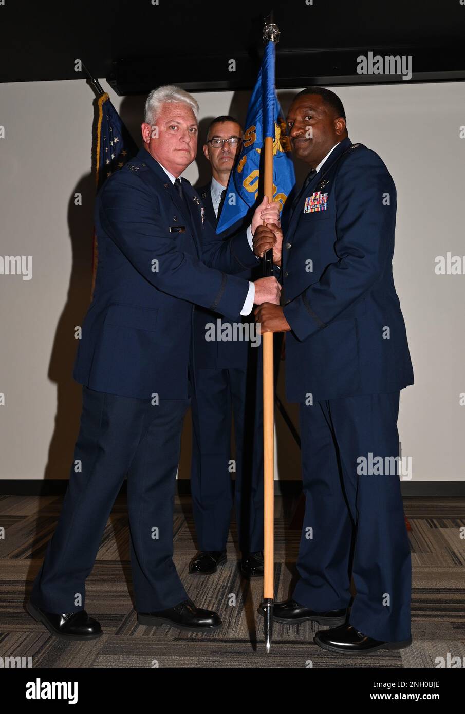 Lt. Col. Jeffrey Randall, right, accepts the 908th Operation Support ...