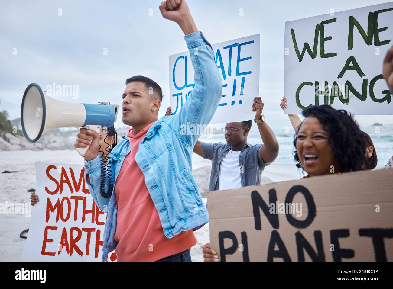Protest, global warming and megaphone with man at the beach for ...