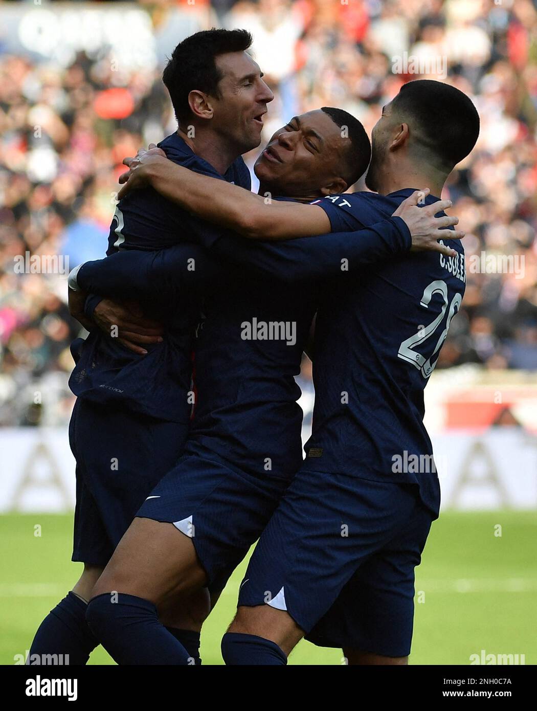 Lionel Messi celebrates with teammate Kylian Mbappe during the French ...