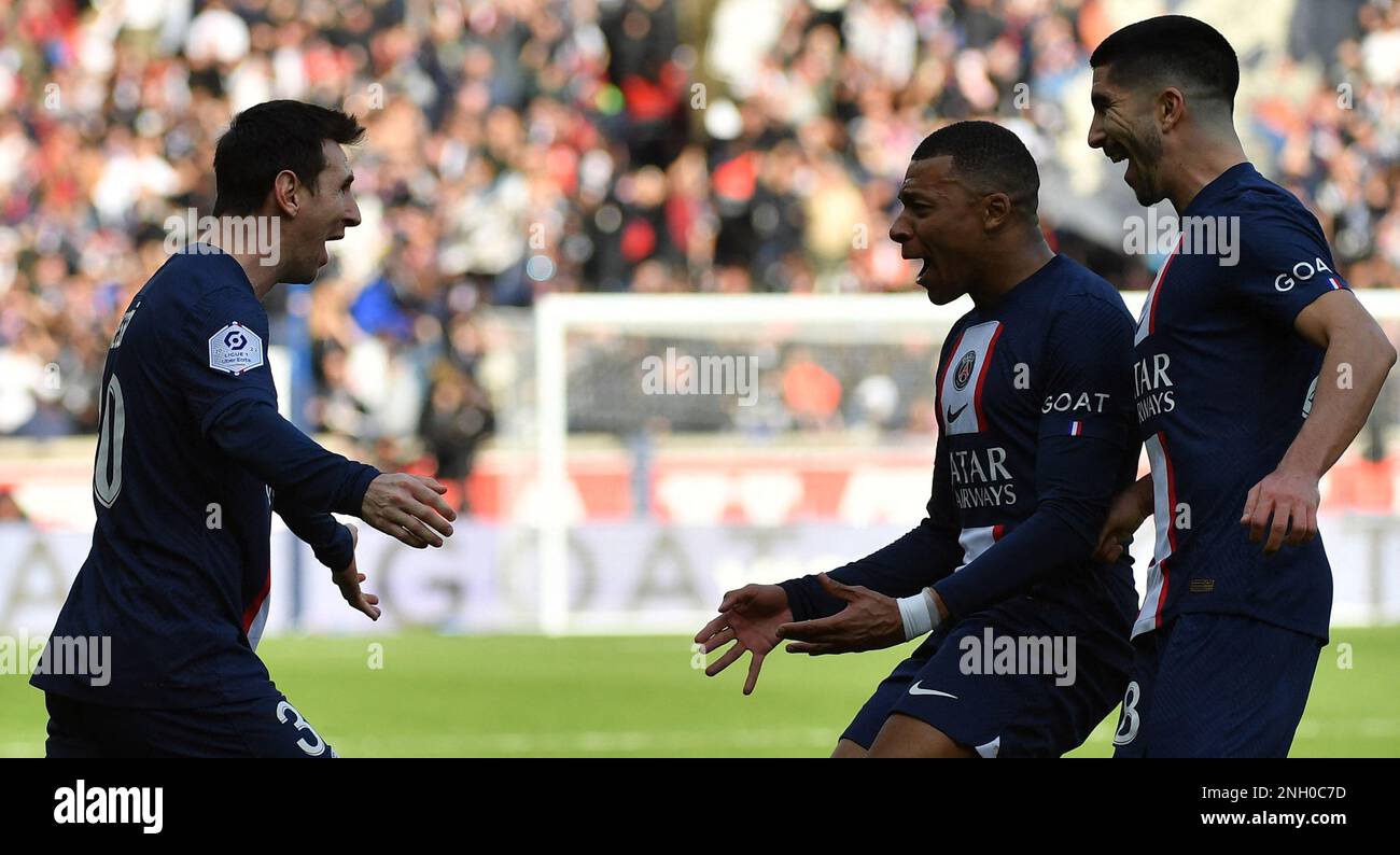 Lionel Messi celebrates with teammate Kylian Mbappe during the French ...