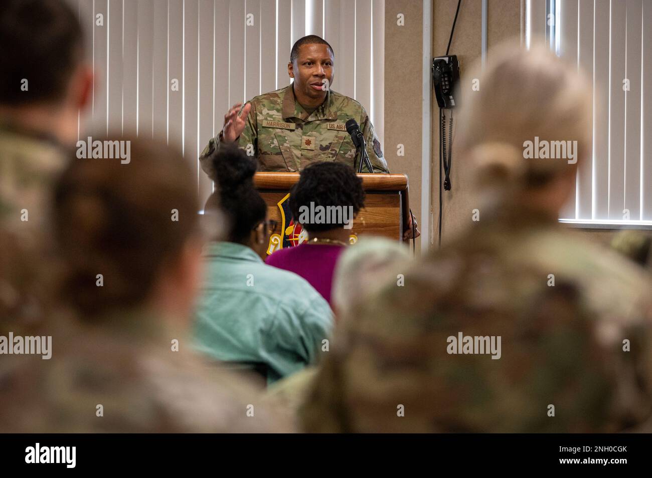 U.S. Air Force Maj. Wayne Harrison addresses the audience after ...
