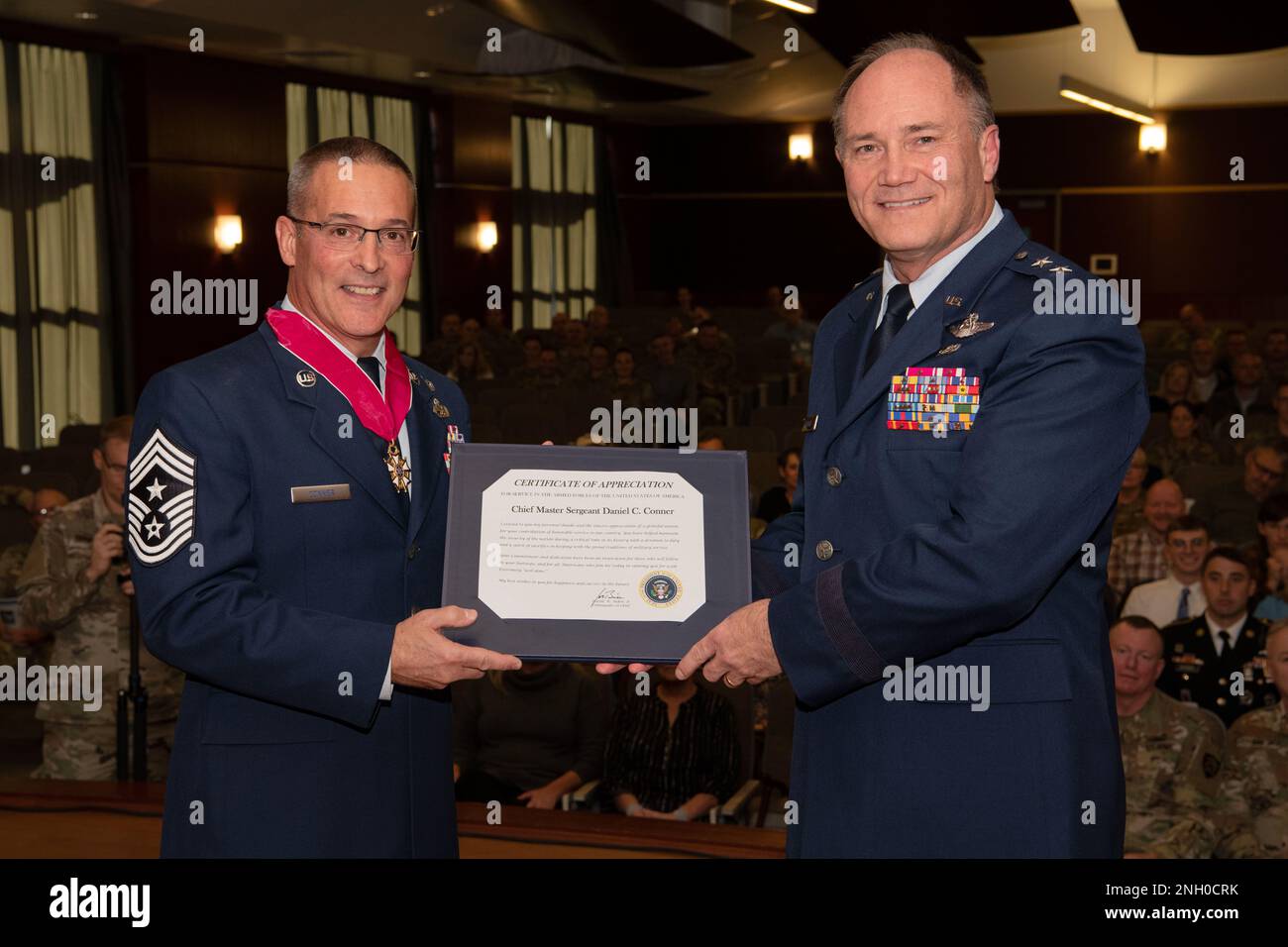 Command Chief Master Sgt. Daniel Conner receives a Certificate of ...