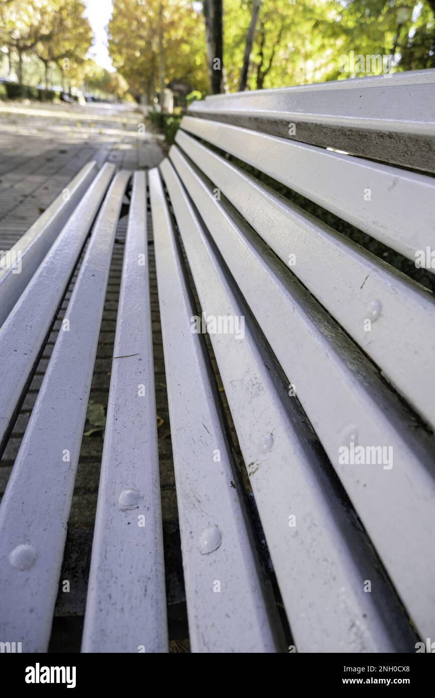 Detail of bench to sit and rest in a park in nature Stock Photo - Alamy