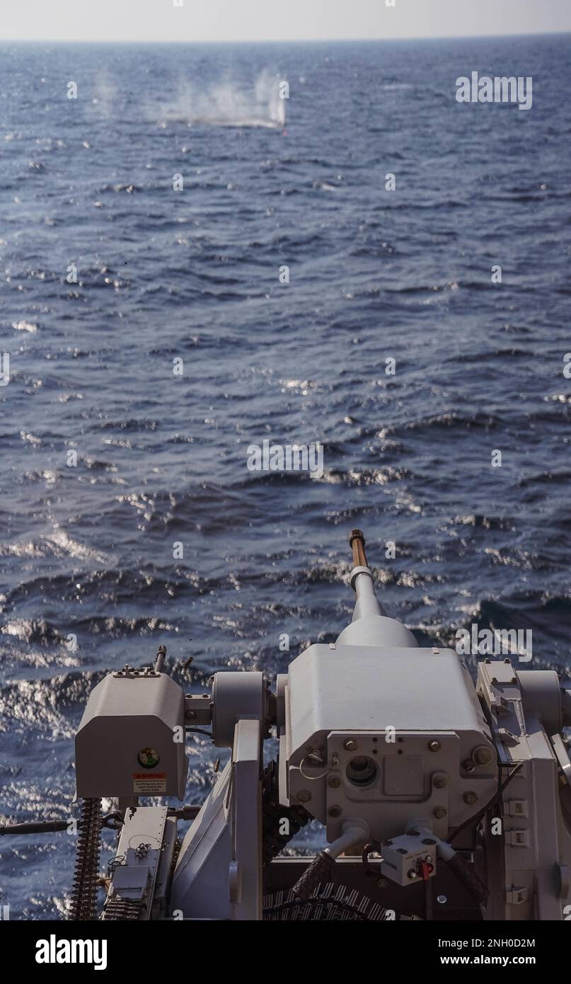 221203-N-EB711-1008 ARABIAN GULF (Dec. 3, 2022) Sailors reload an MK38 ...