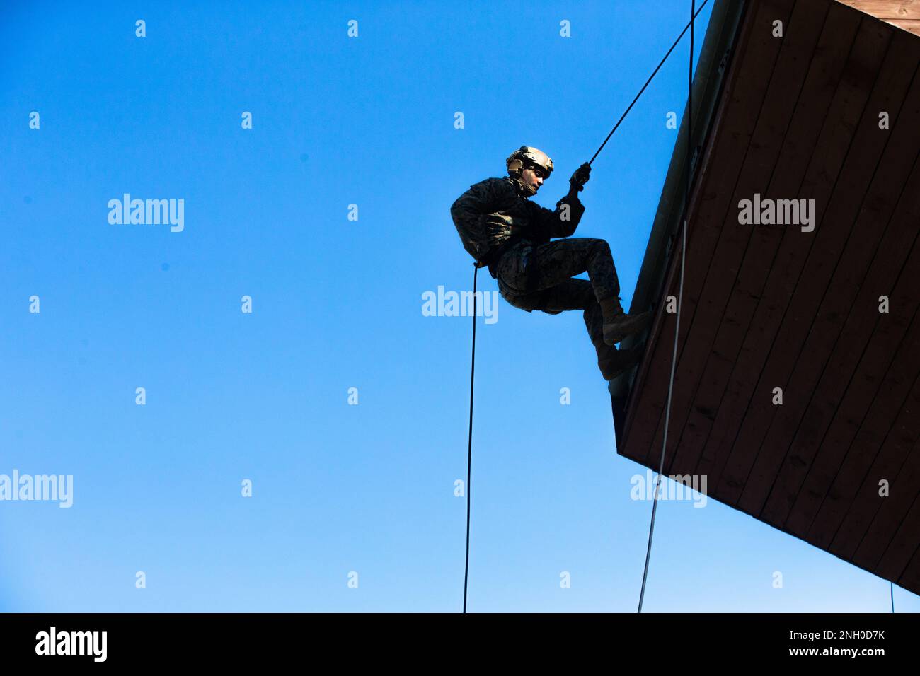 U.S. Marine Corps Cpl. Derrick Burke, a rifleman with 3d Battalion, 4th ...