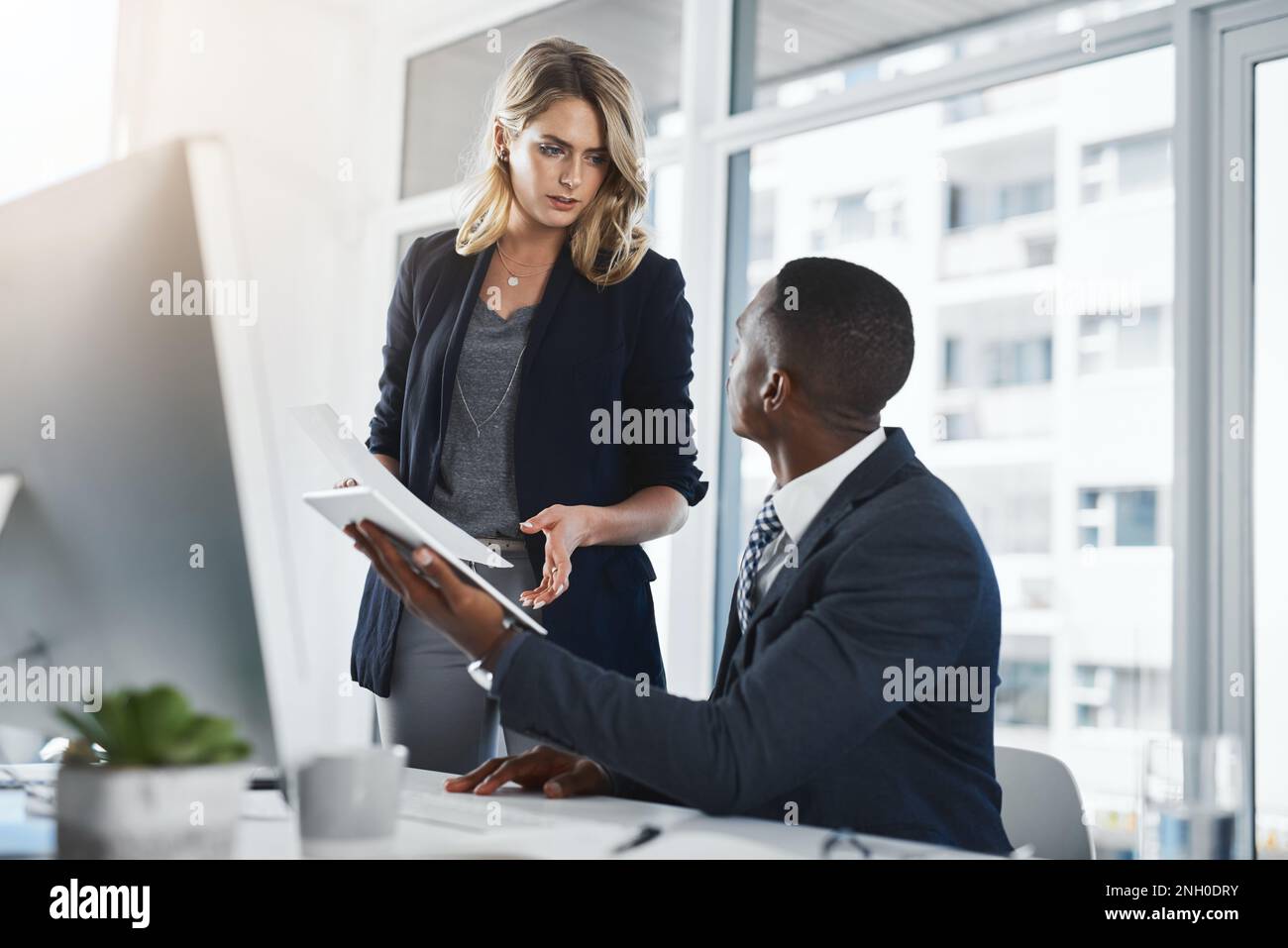 Lets make a choice based on the info we have here. two businesspeople ...