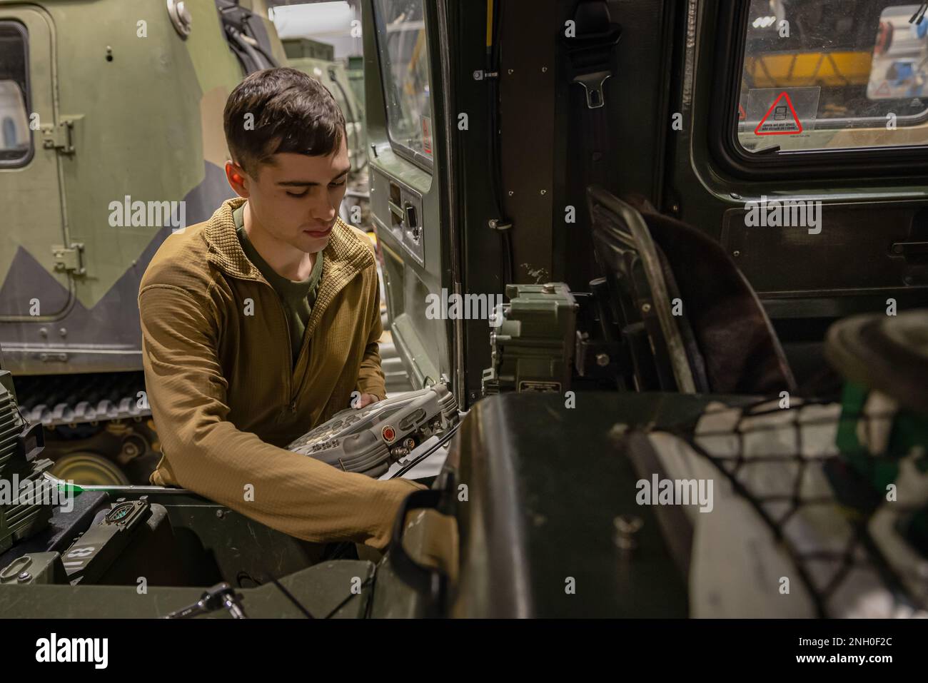 U.S. Marine Corps Cpl. Holden Banfield, a telephone systems/personal ...