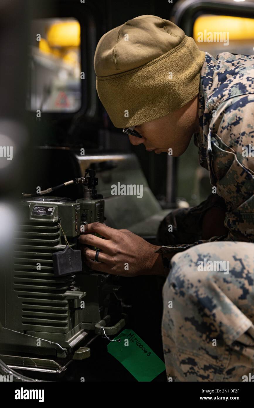 U.S. Marine Corps Cpl. Holden Banfield, a telephone systems/personal ...