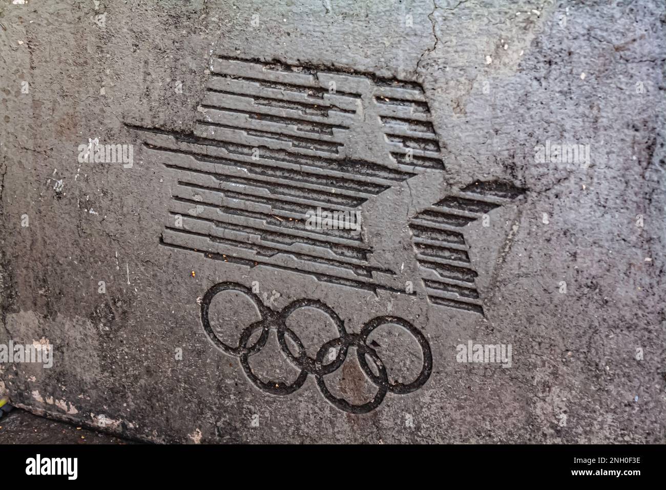 The Olympic rings on a park bench in Los Angeles, commemorating the ...