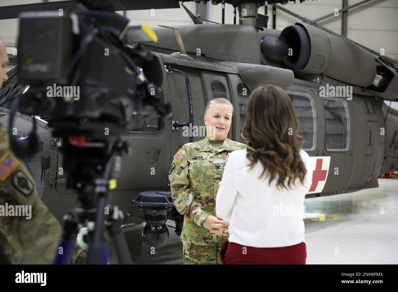 Col. Michele Harper speaks to media prior to the 449th Combat Aviation ...