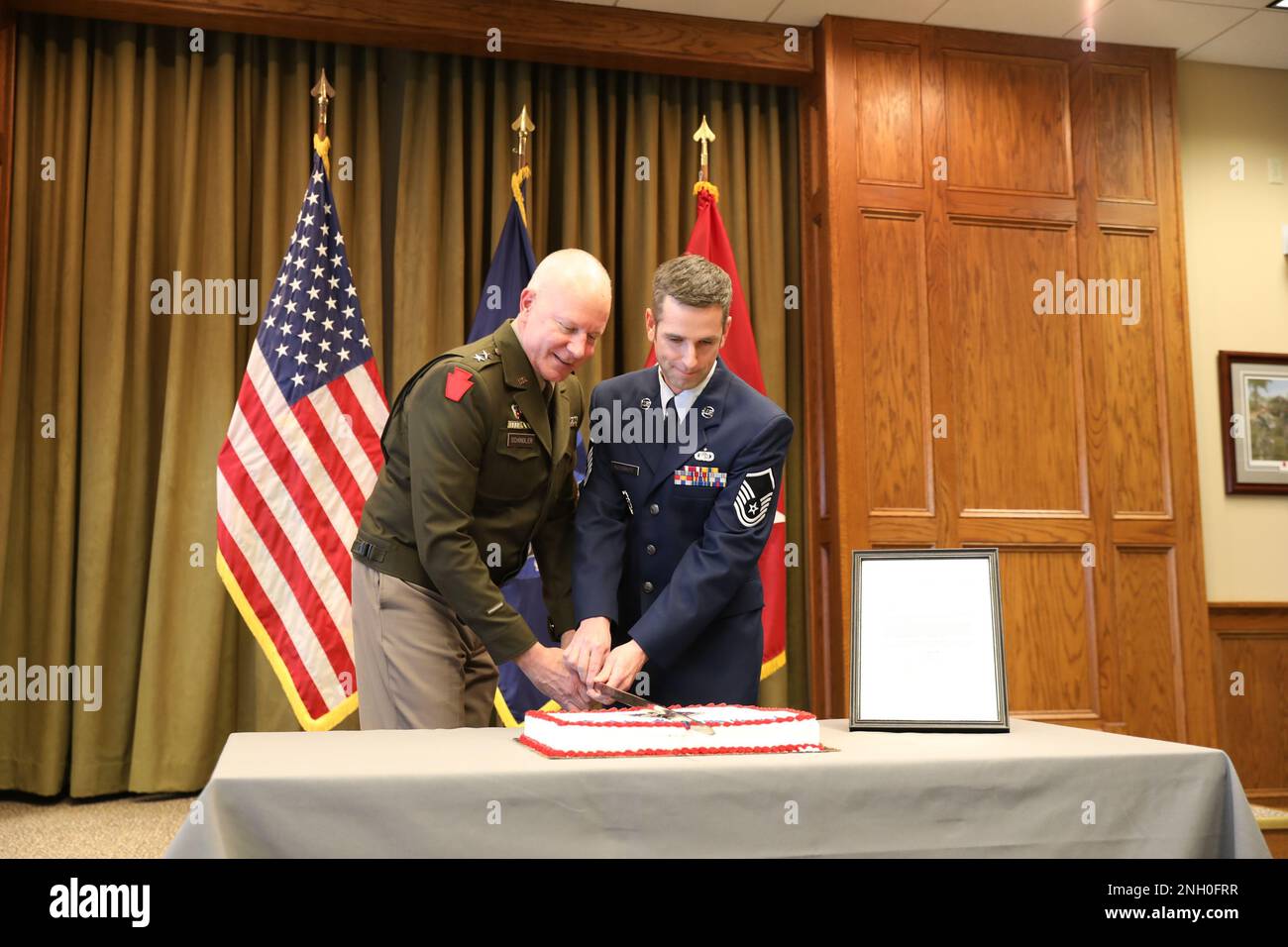 U.S. Army Maj. Gen. Mark Schindler, left, the Adjutant General of ...