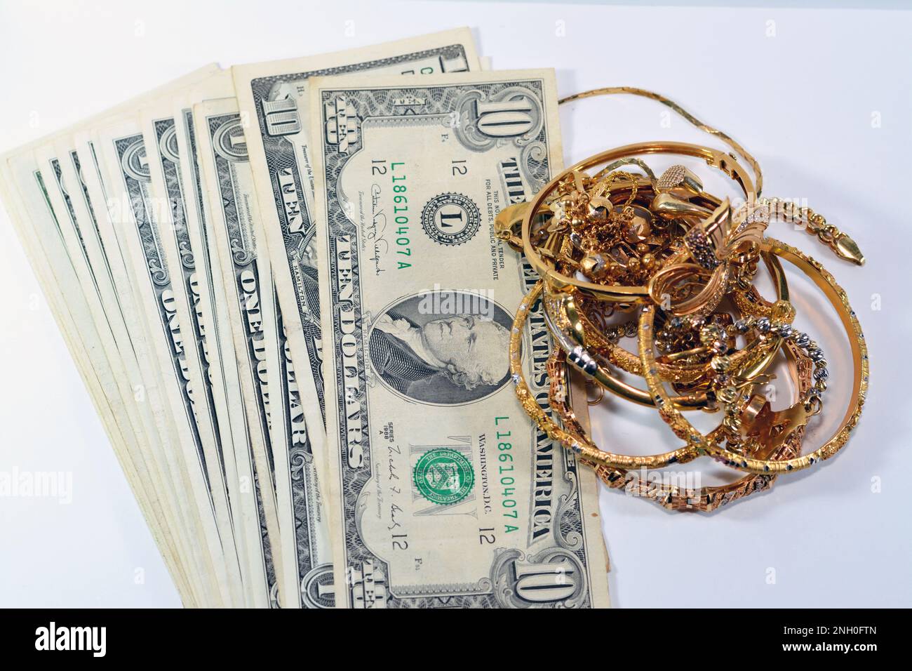 Jewellery or jewelry with USD American dollars cash money banknotes ...