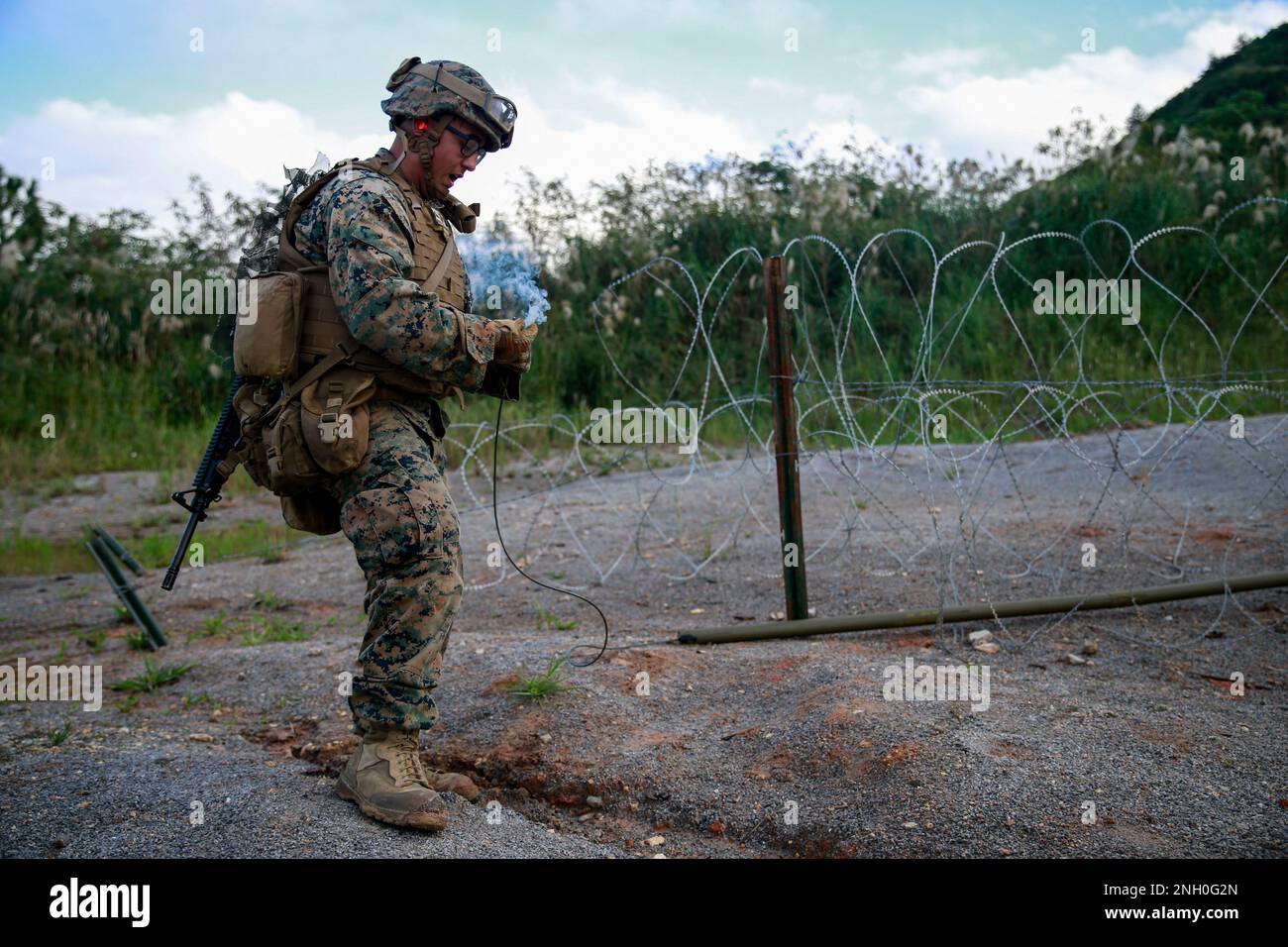 U.S. Marine Corps Lance Cpl. Dillyn A. Munoz, a combat engineer with ...