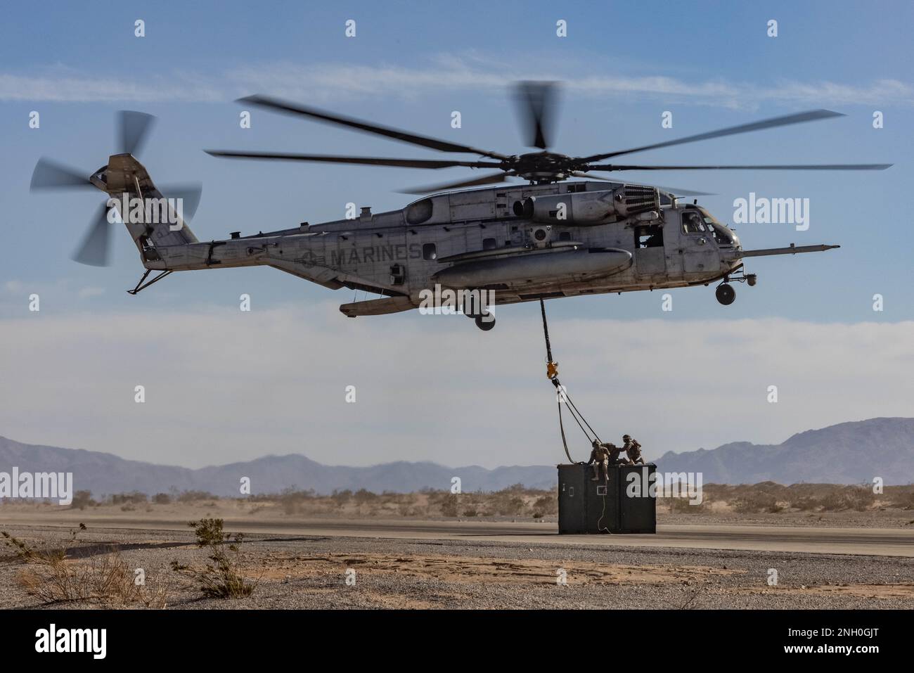 A U.S. Marine Corps CH-53E Super Stallion with Marine Heavy Helicopter ...