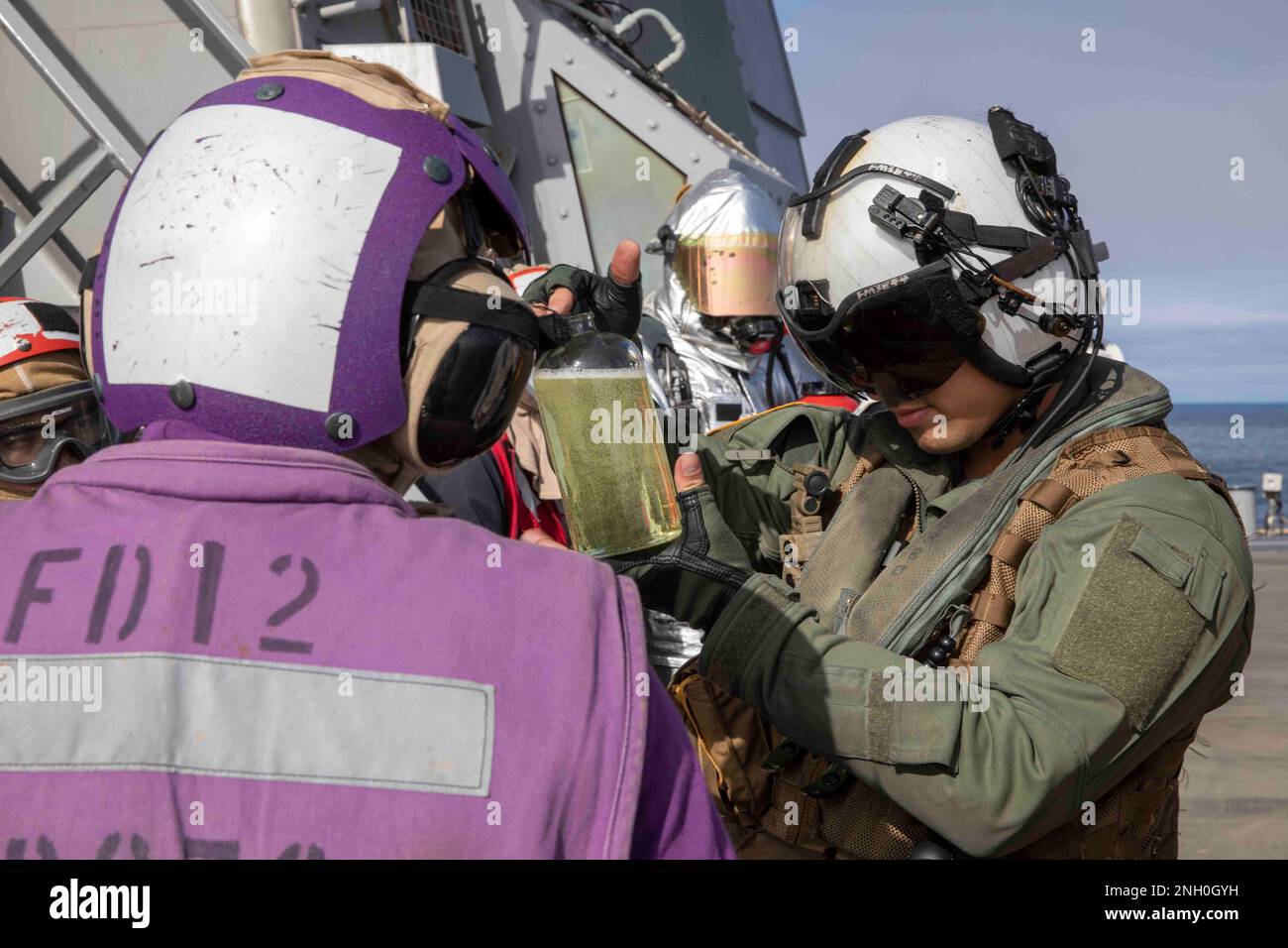 221204-N-SN516-1075 PACIFIC OCEAN (Dec. 4, 2022) A U.S. Navy Sailor ...