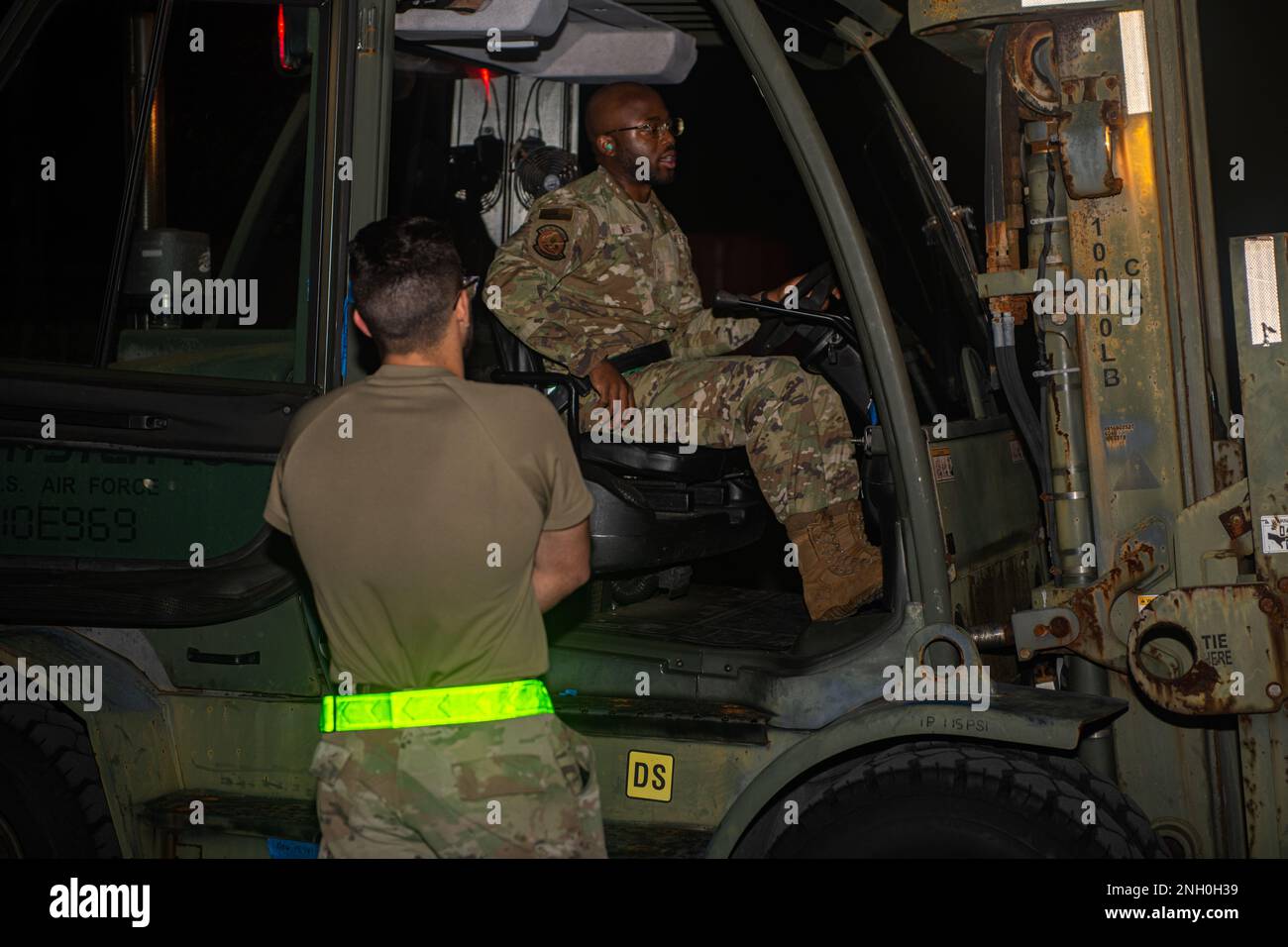 Senior Airman Seth Shealy, left, 18th Logistics Readiness Squadron ...