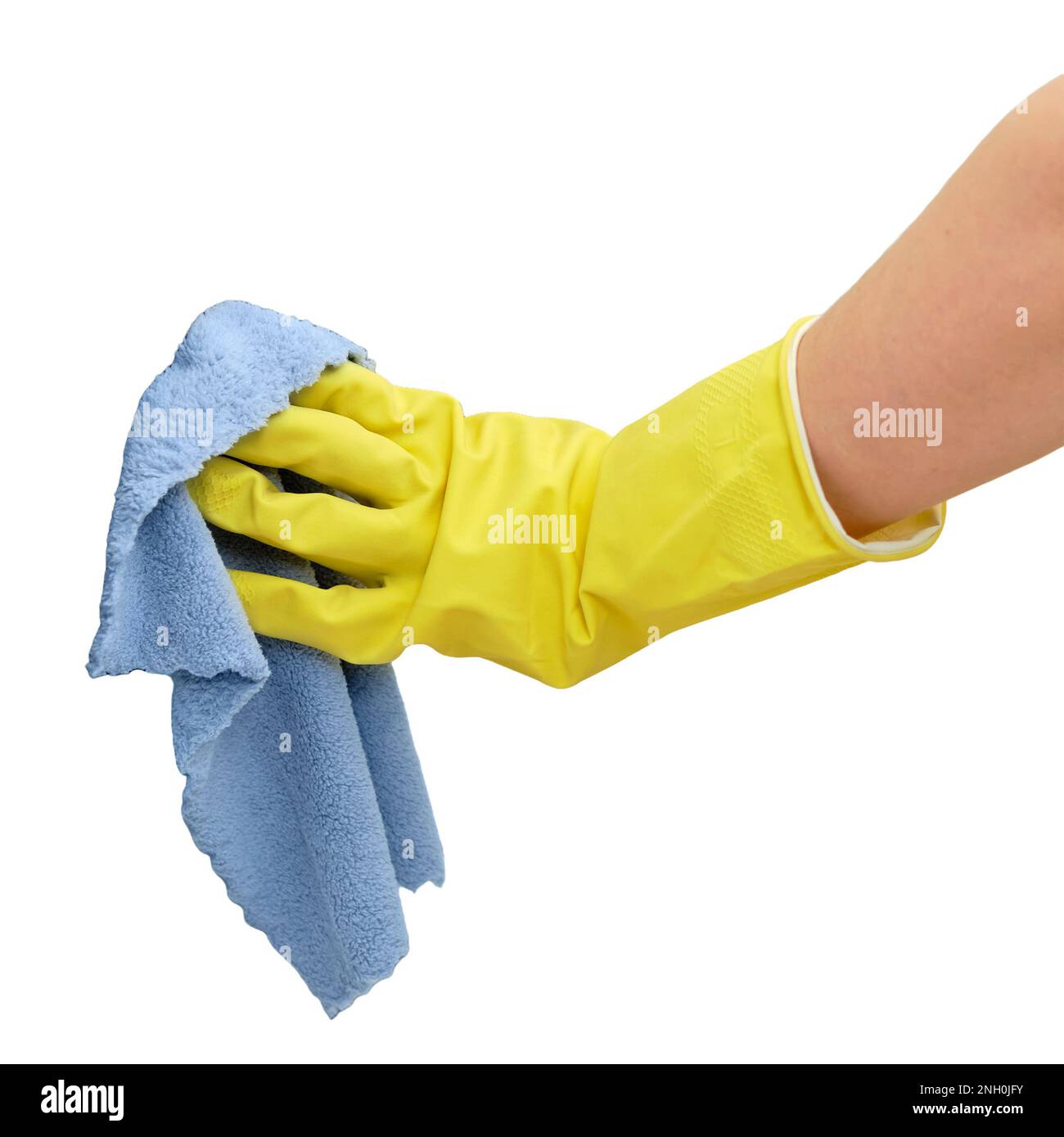 A woman wipes an electric oven with a rag when cleaning a home kitchen ...