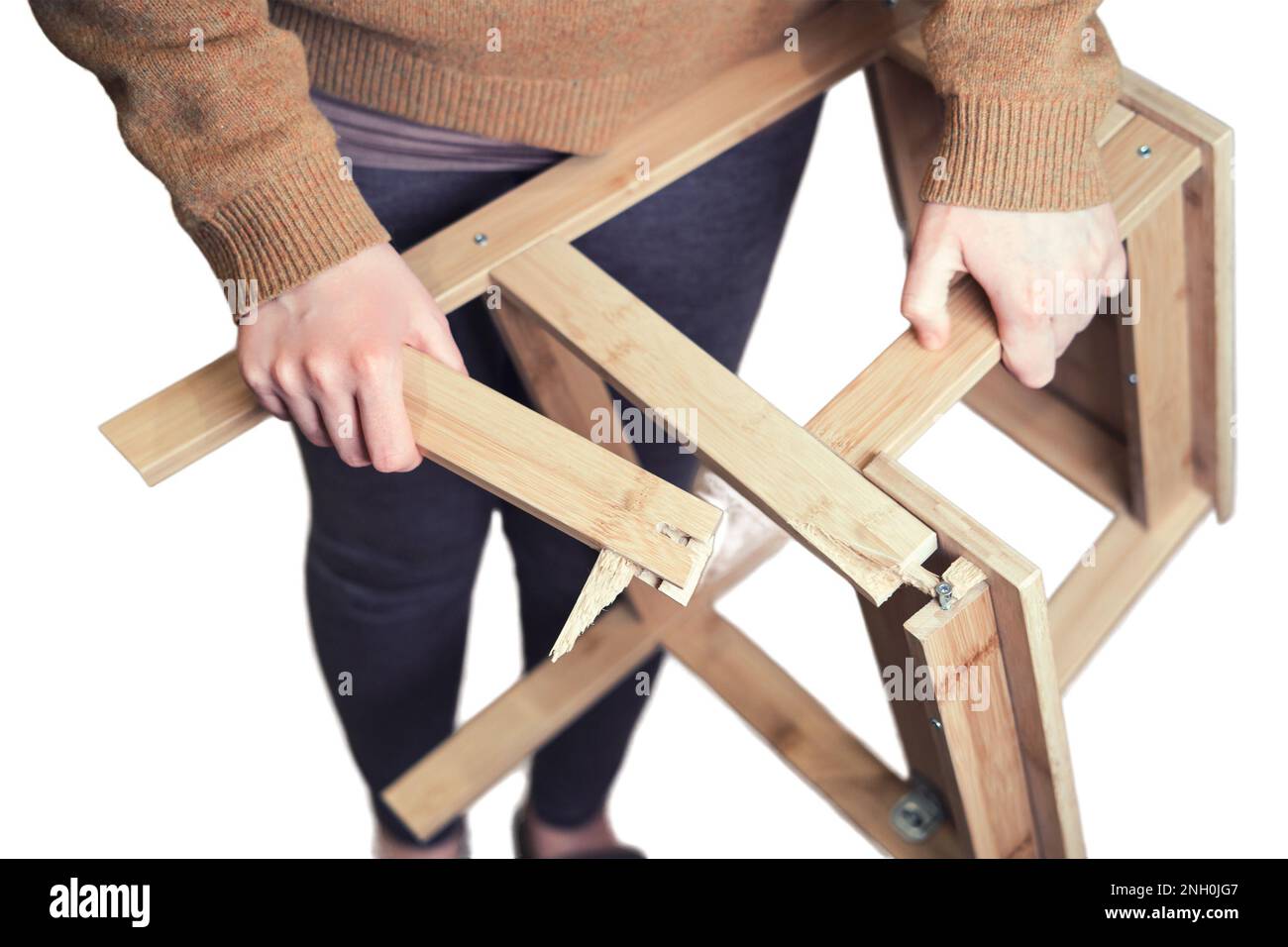 Leg of the wooden chair broke at the base, isolated on a white ...