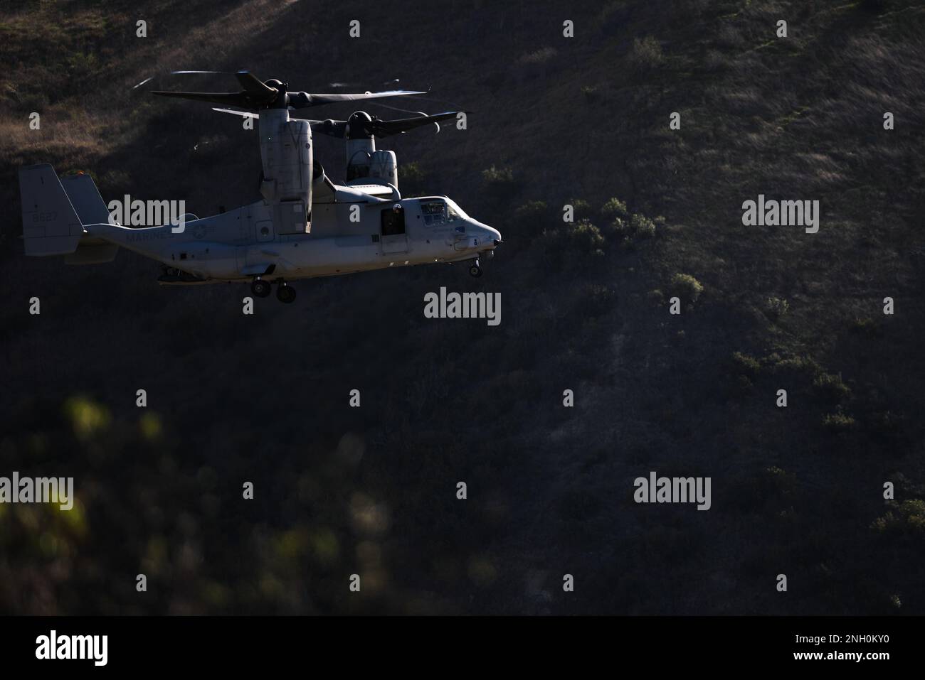 A U.S. Marine MV-22 Osprey tiltrotor aircraft with Marine Medium ...