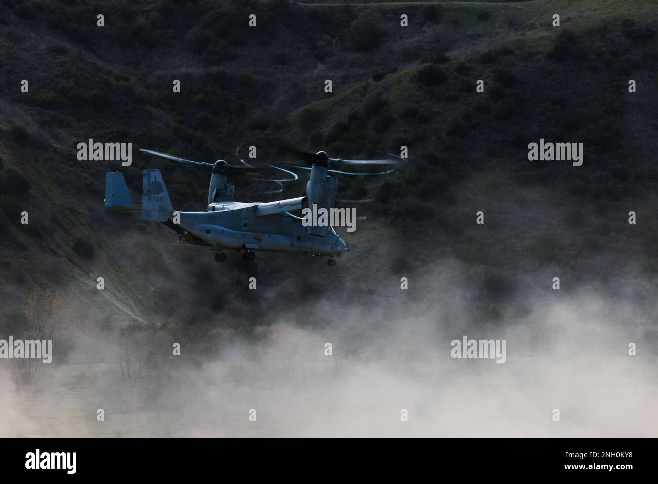 A U.S. Marine MV-22 Osprey tiltrotor aircraft with Marine Medium ...