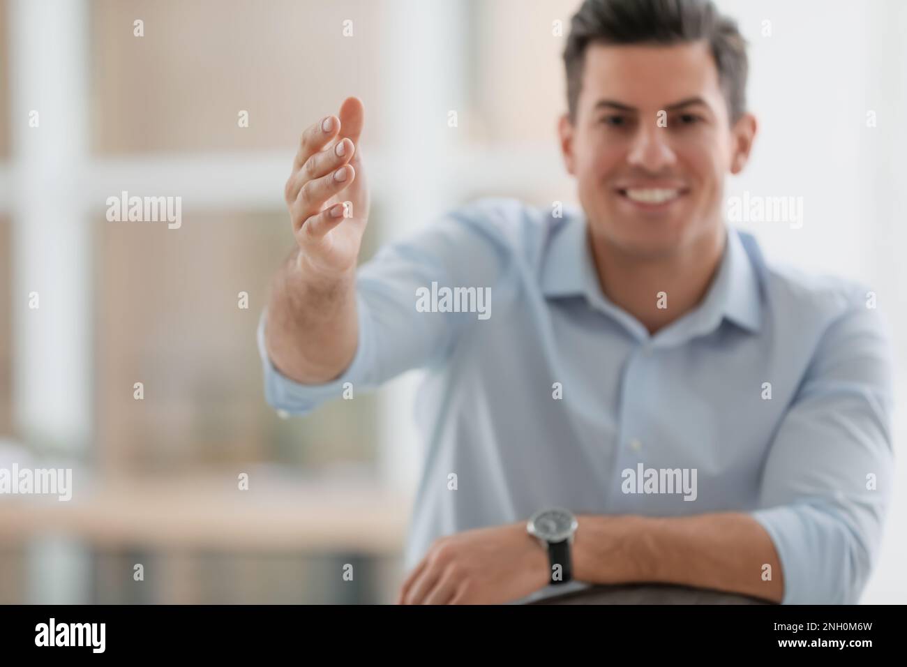 Businessman reaching out hand handshake hi-res stock photography and ...
