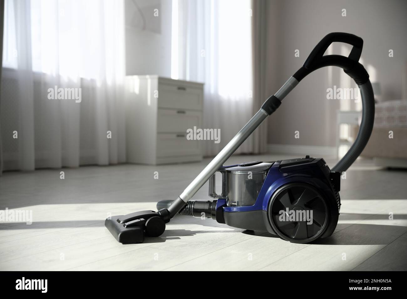 Vacuuming bedroom hi-res stock photography and images - Alamy