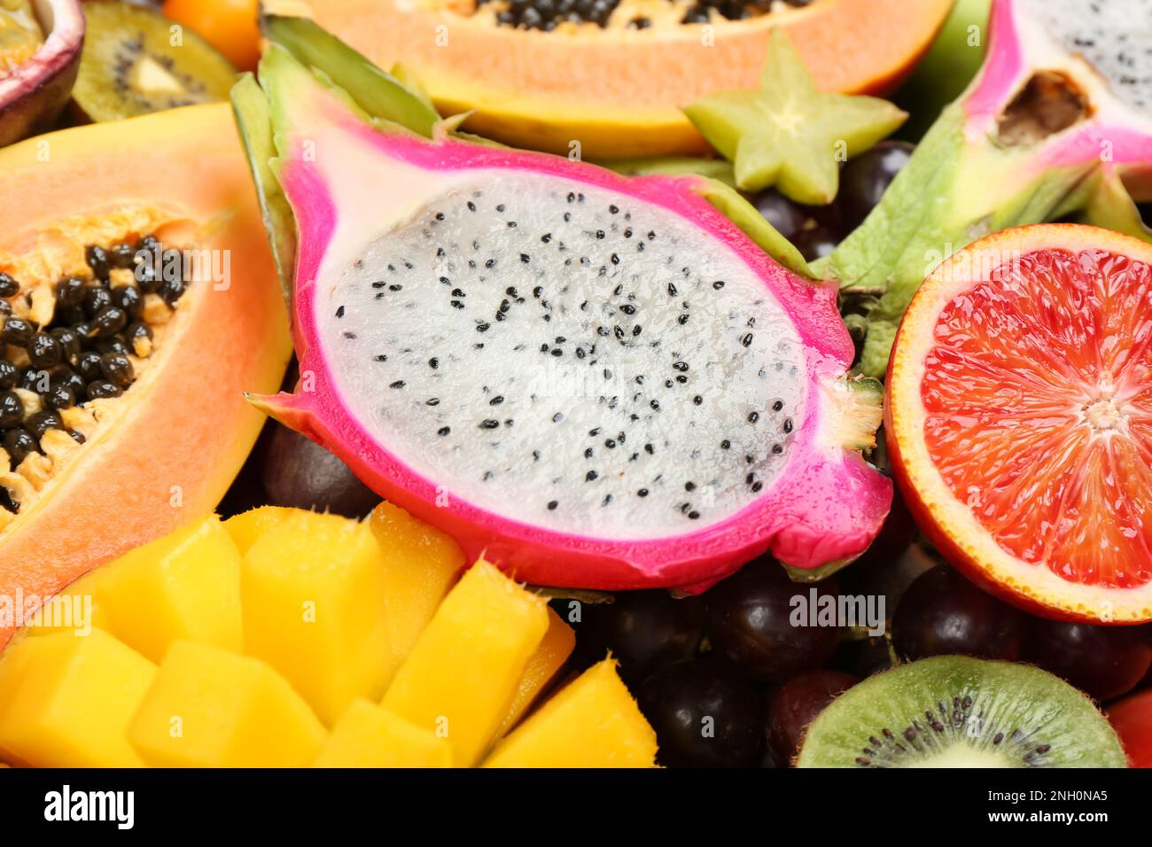 Many different delicious exotic fruits as background, closeup Stock ...