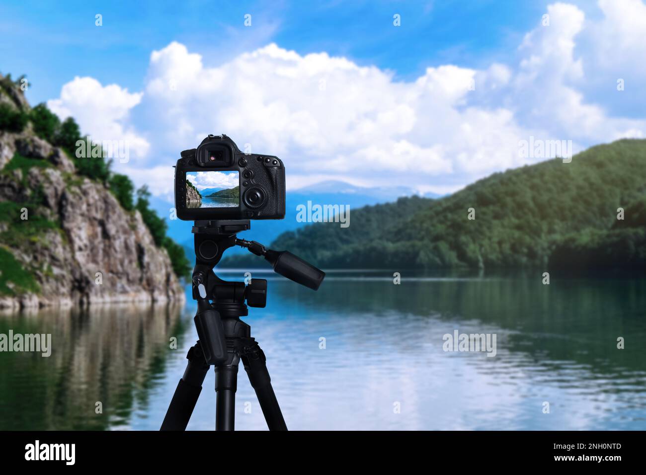 Taking photo camera mounted hi-res stock photography and images - Alamy
