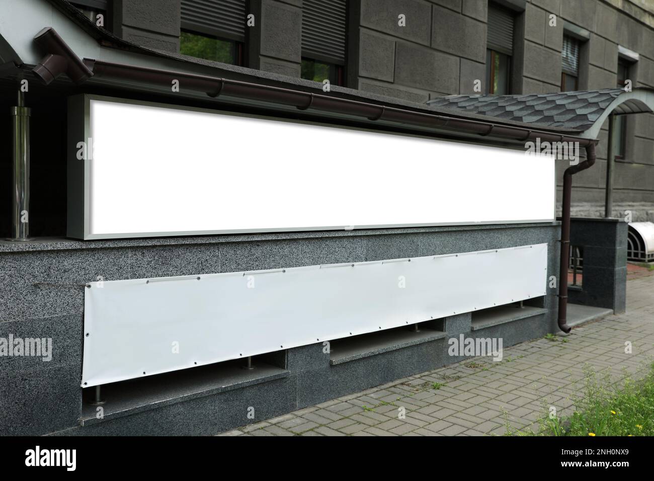 Blank banner on building facade outdoors. Advertising board design ...