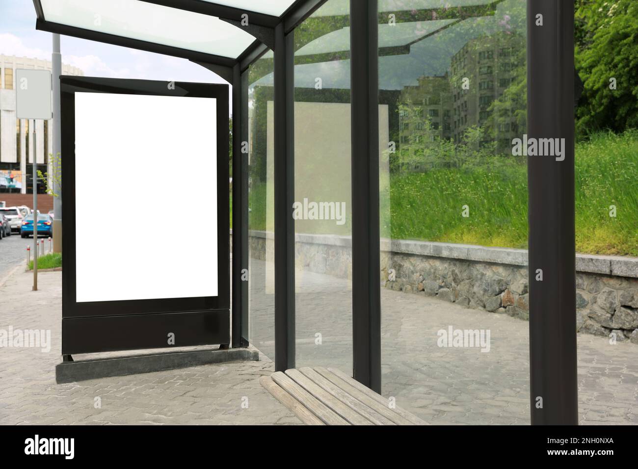 Blank advertising board on bus stop. Space for design Stock Photo - Alamy