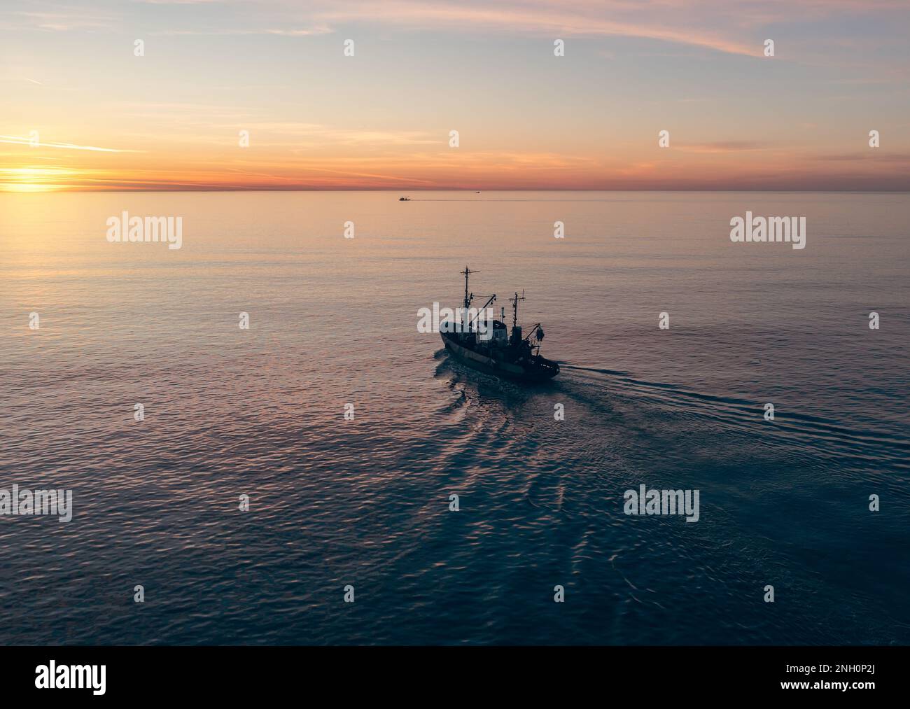 Small Fishing Boat catch fish, aerial Top View from drone. Industrial ...