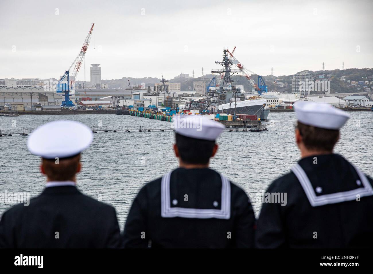YOKOSUKA, Japan (Dec. 5, 2022) Sailors stand at parade rest aboard ...