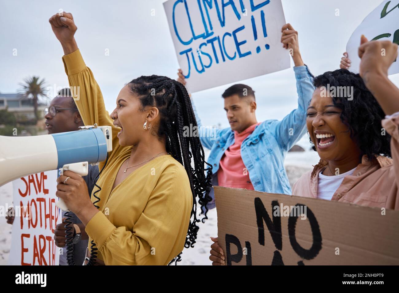 Protest, climate change and megaphone with black woman at the beach for ...