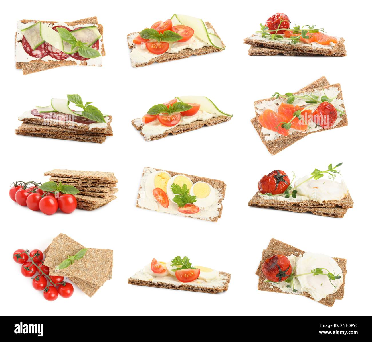 Fresh rye crispbreads with different toppings on white background ...