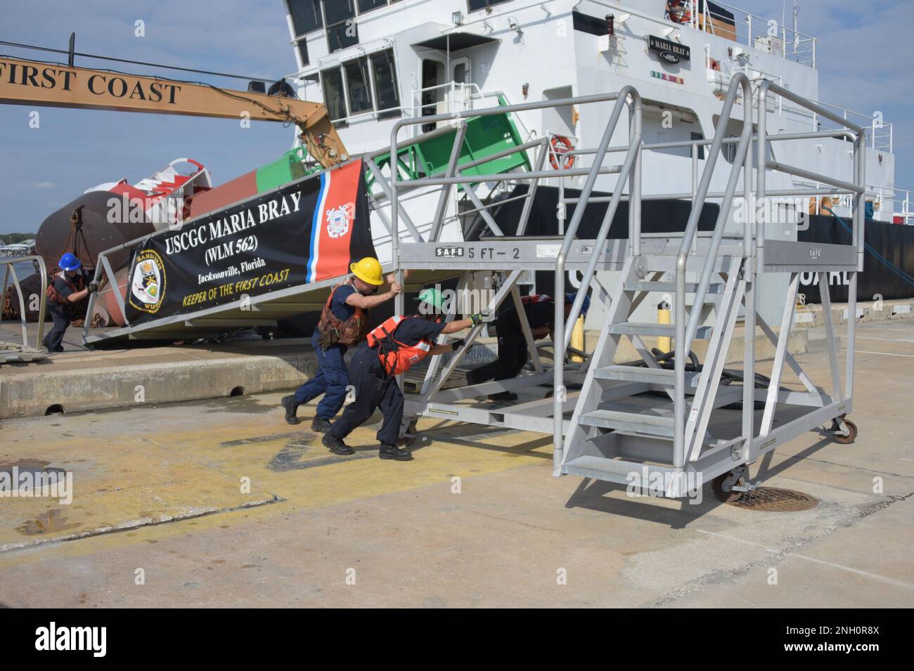 U.S. Coast Guardsmen from the coastal buoy tender USCGC Maria Bray (WLM ...