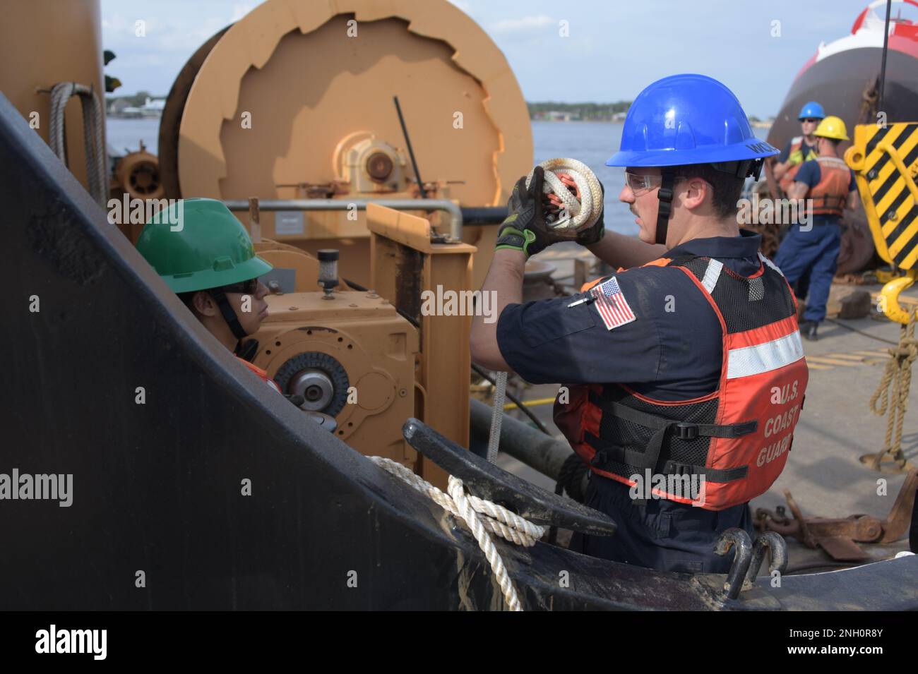 U.S. Coast Guardsmen from the coastal buoy tender USCGC Maria Bray (WLM ...