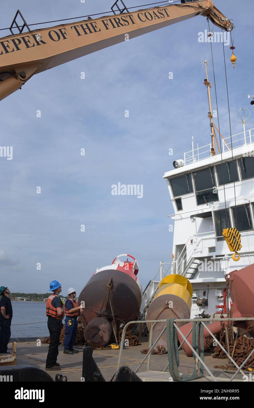 U.S. Coast Guardsmen from the coastal buoy tender USCGC Maria Bray (WLM ...