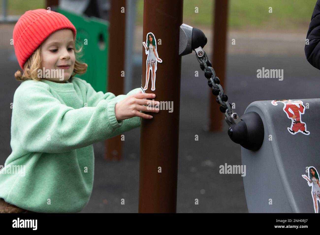 EDITORIAL USE ONLY Tanner, aged 5, interacts with the 'Friendly Faces ...