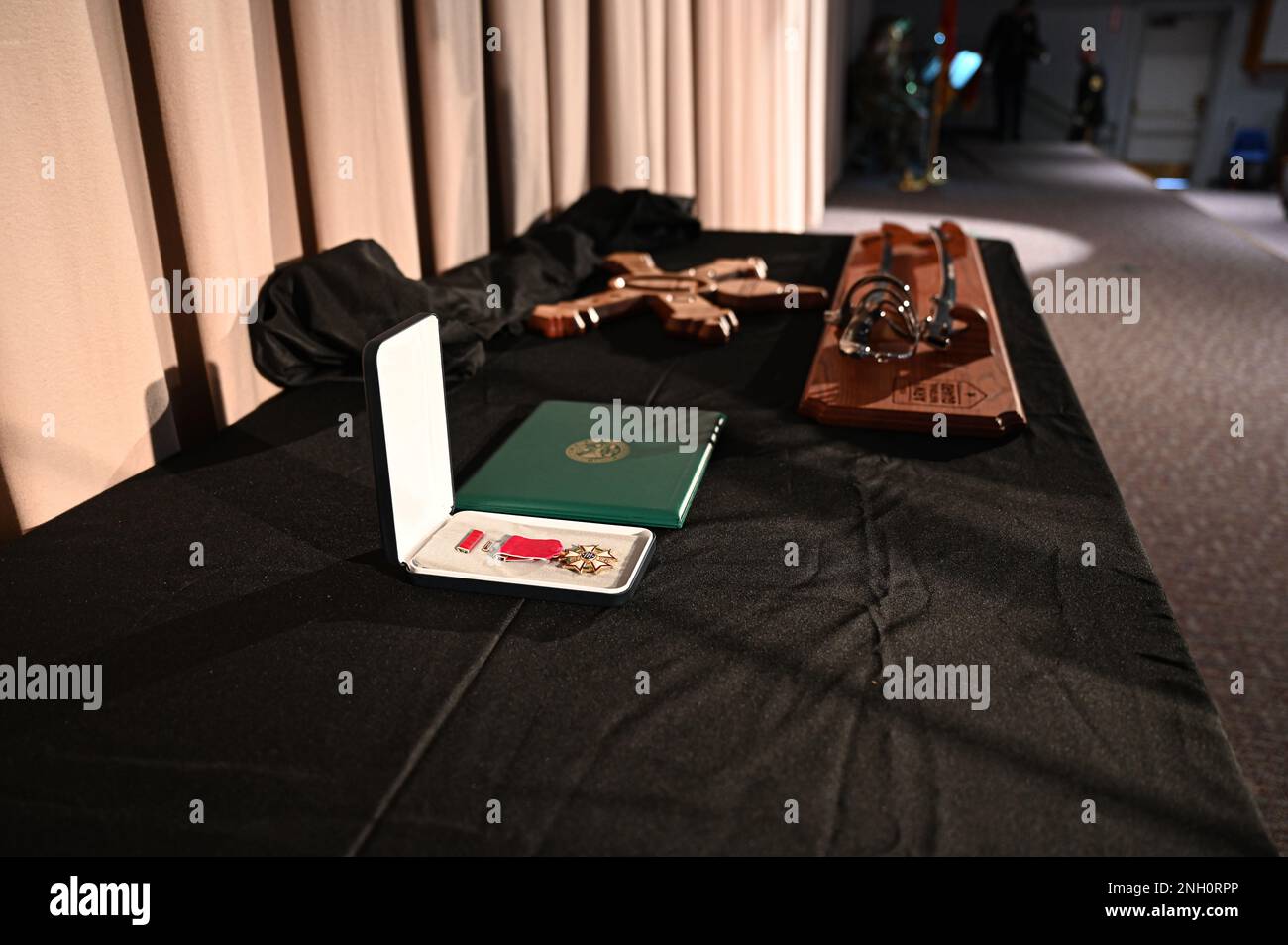 Awards for Command Chief Warrant 5 Brian Searcy are arranged on the ...