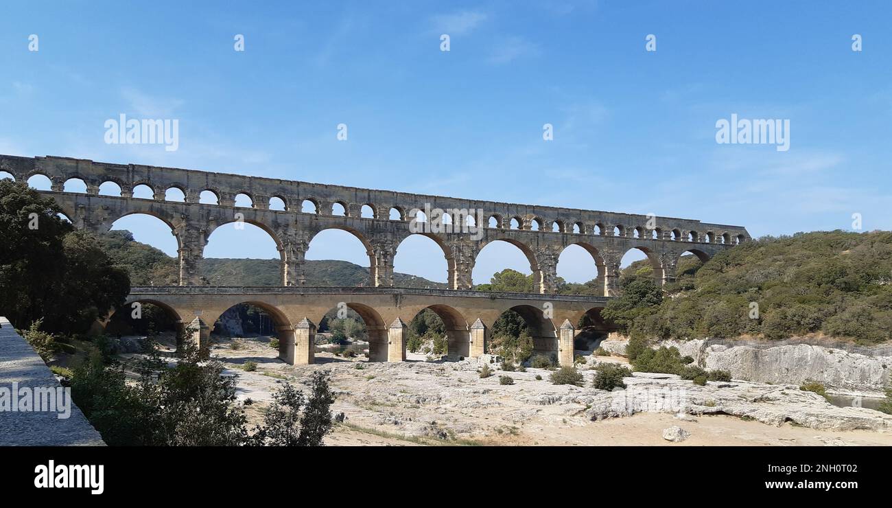 Three-tiered aqueduct french Pont du Gard bridge in provence natural ...