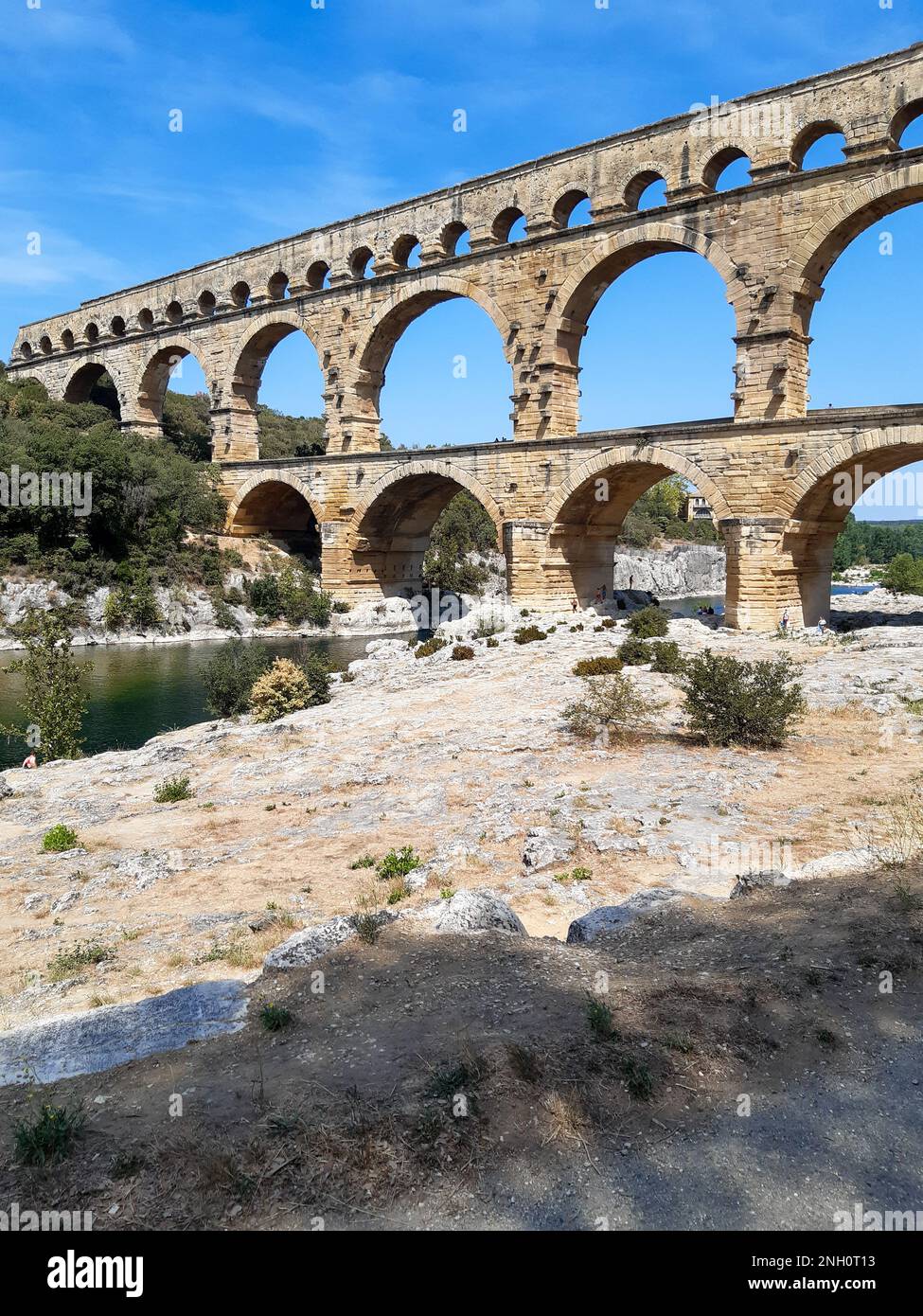 Three-tiered aqueduct Pont du Gard bridge in provence natural park ...